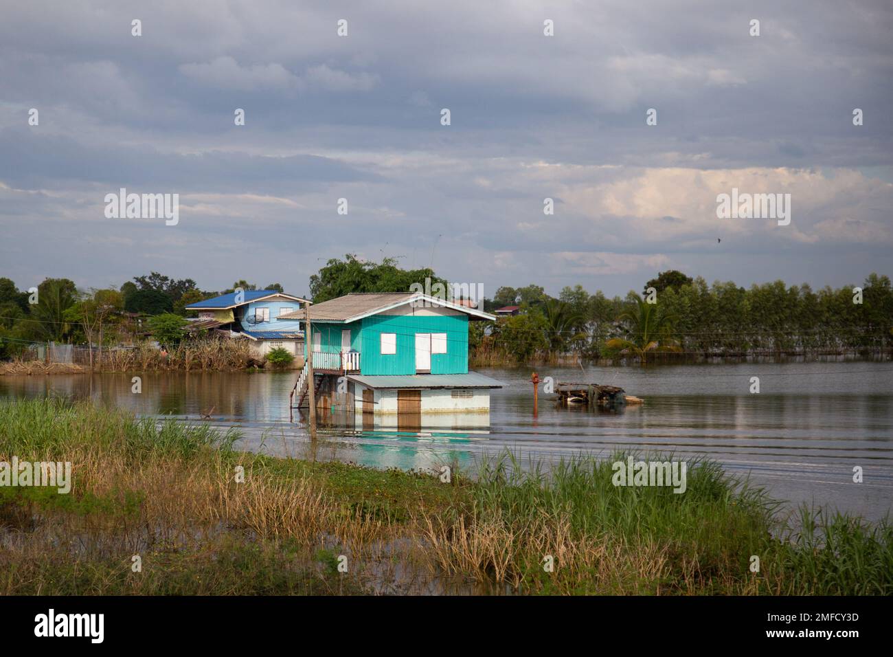 Thailand House in High Water - Thailand Stock Photo - Alamy
