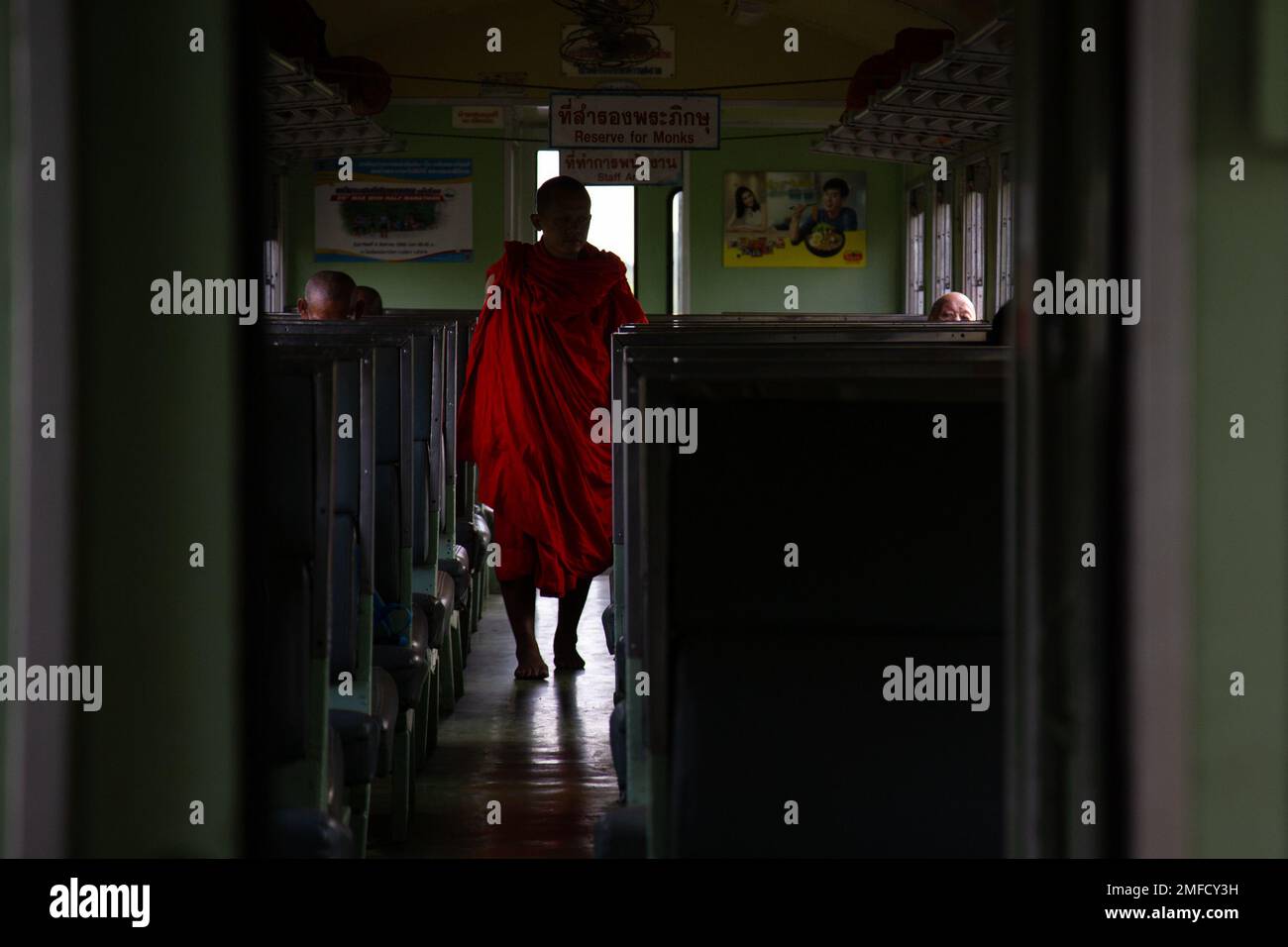 Monk with Red Robe on Train in Central Thailand Stock Photo - Alamy