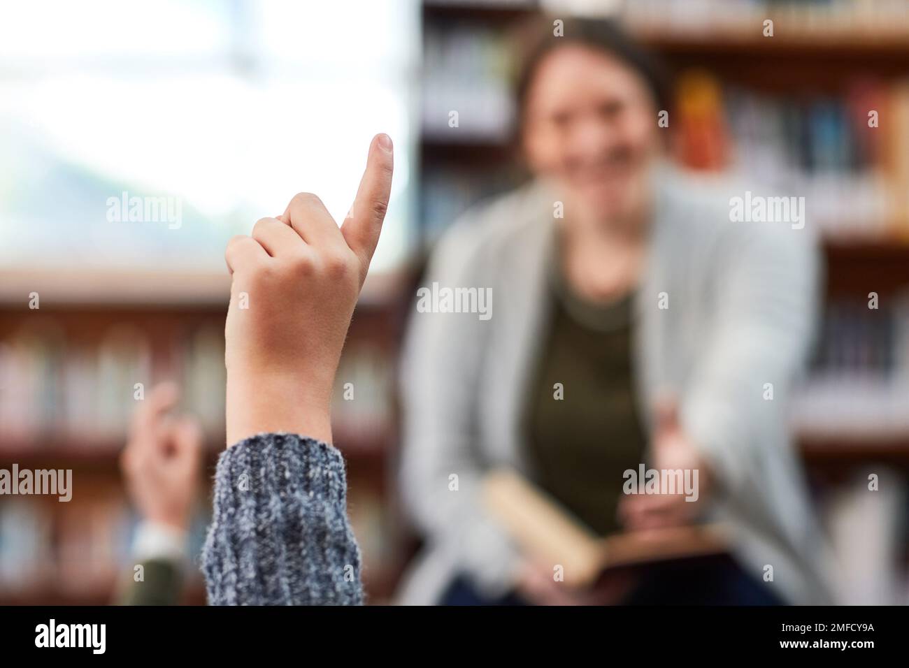 Pick me, I know the answer teacher. elementary school kids hand raised ...