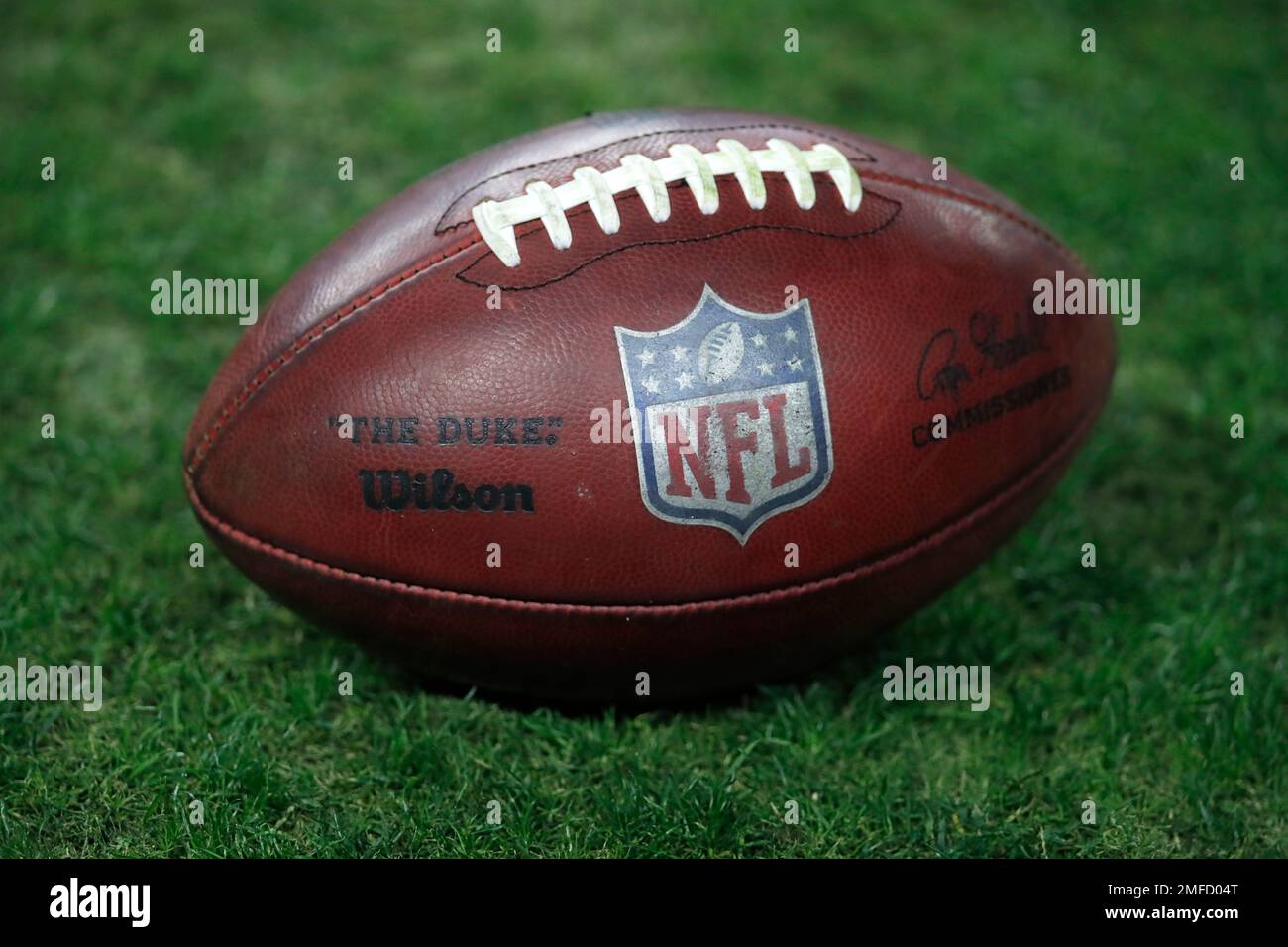 The official NFL football called "The Duke" made by Wilson sits on the ...