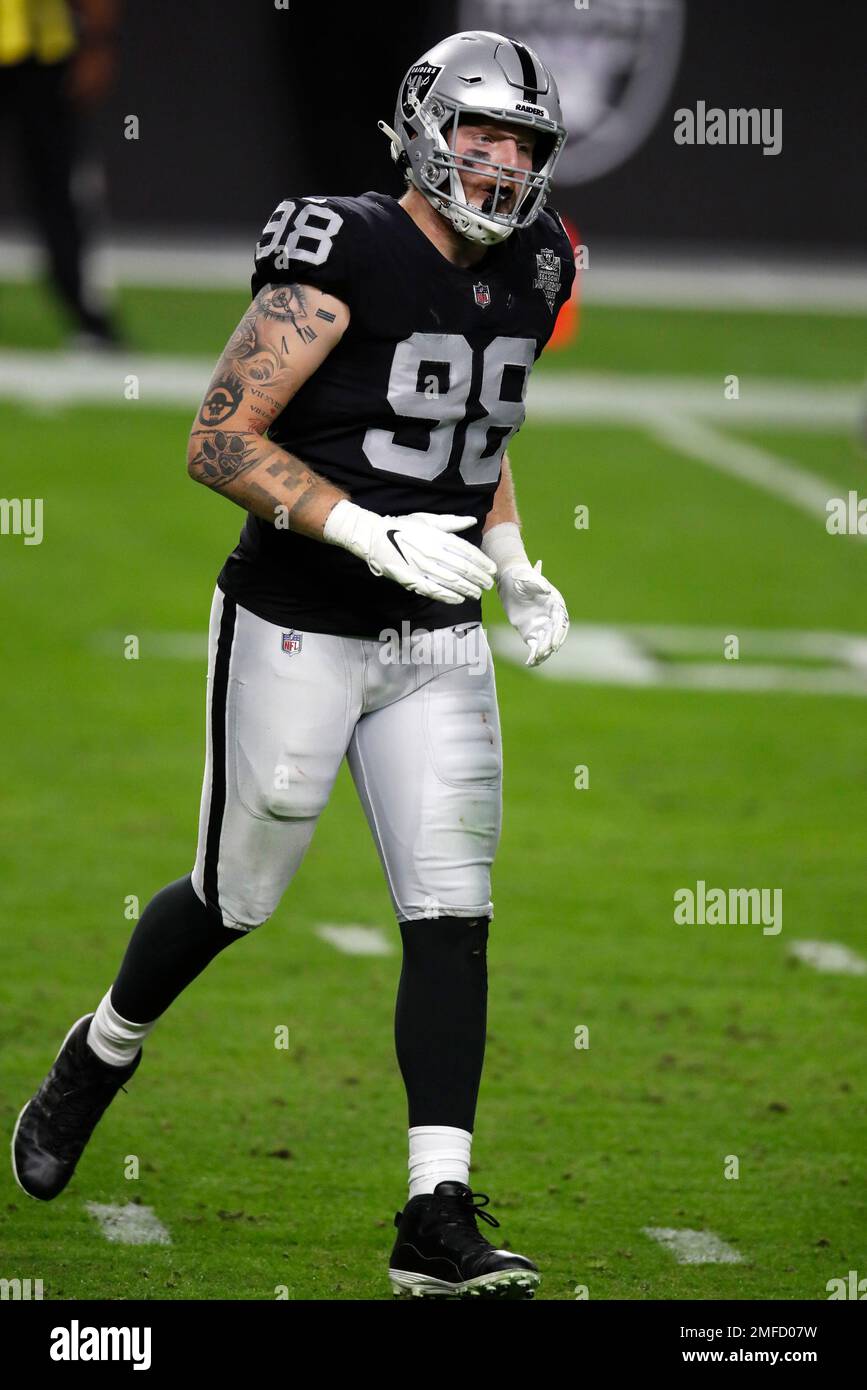 Las Vegas Raiders defensive end Maxx Crosby (98) runs off the field ...