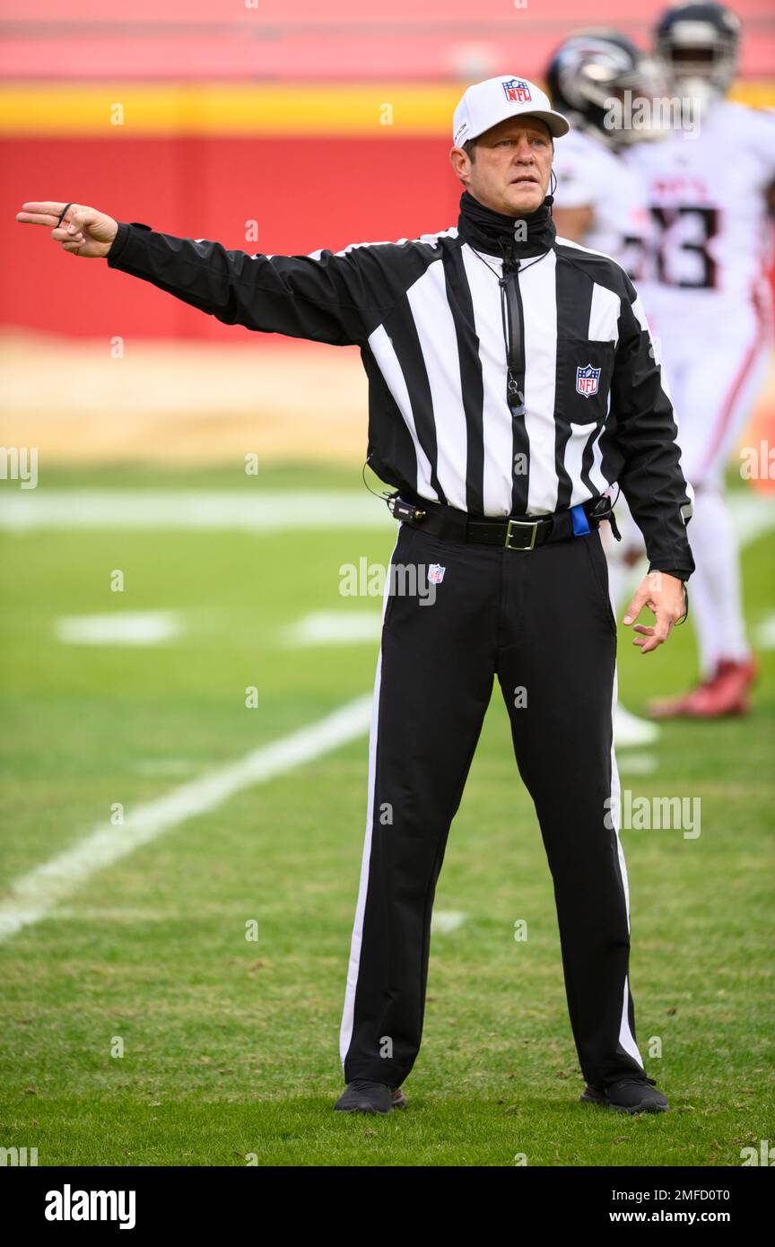Referee Craig Wrolstad (4) calls a penalty during the second half of an ...