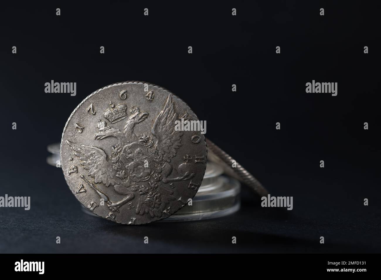 Numismatics. Old collectible coins on the table Stock Photo - Alamy