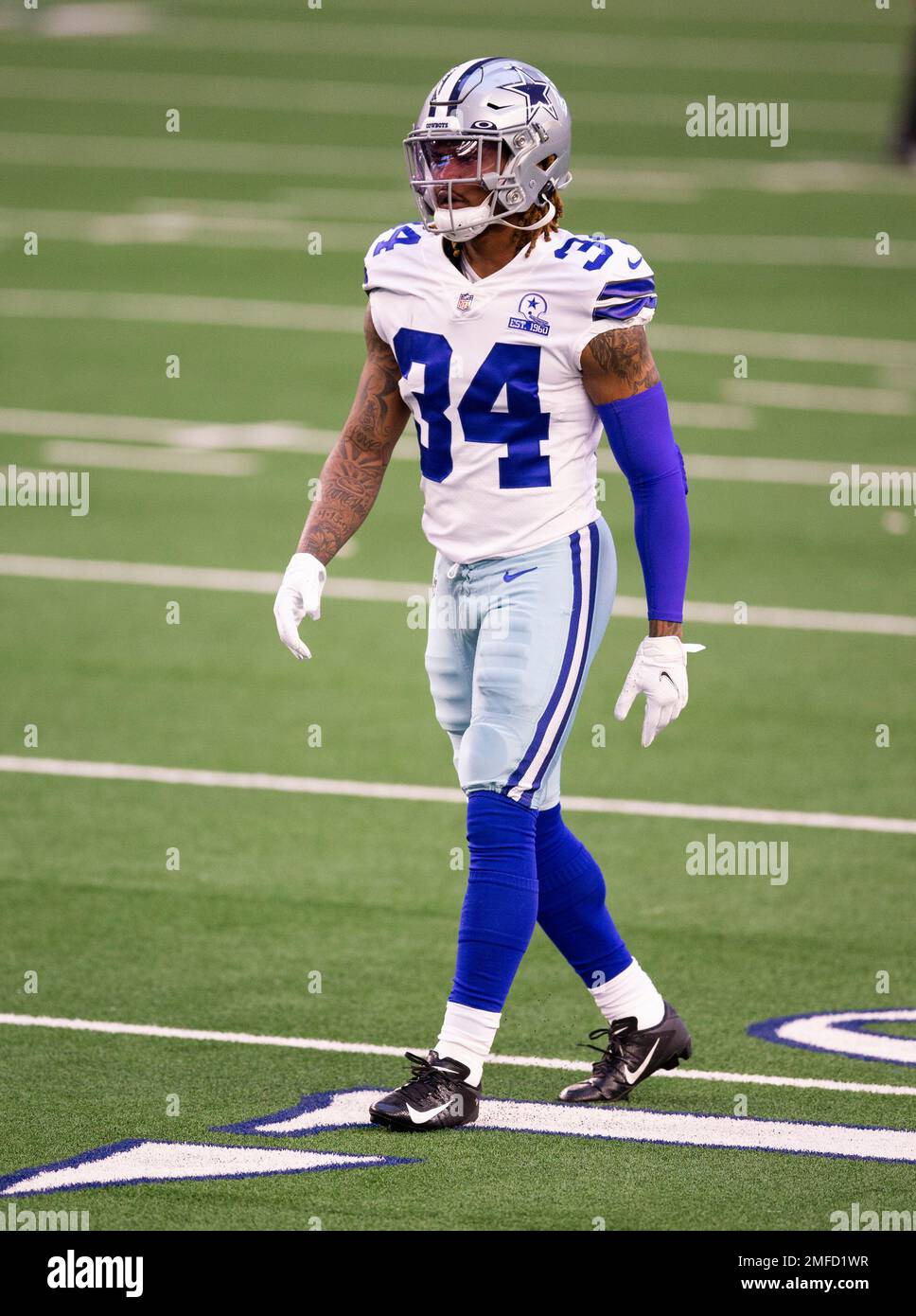 Dallas Cowboys running back Rico Dowdle (34) warms up before an NFL ...