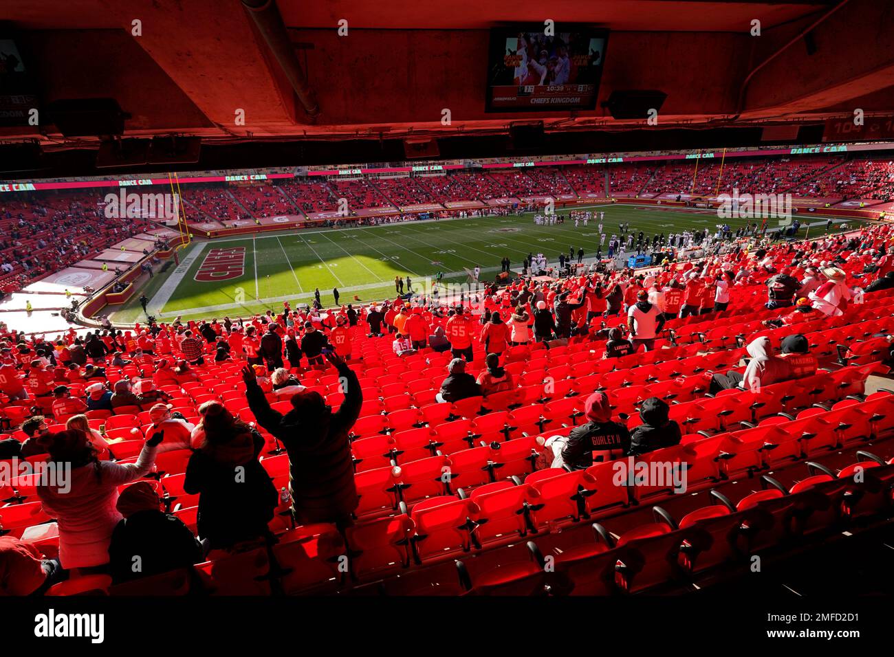 Spectators cheer during the second half of an NFL football game between ...