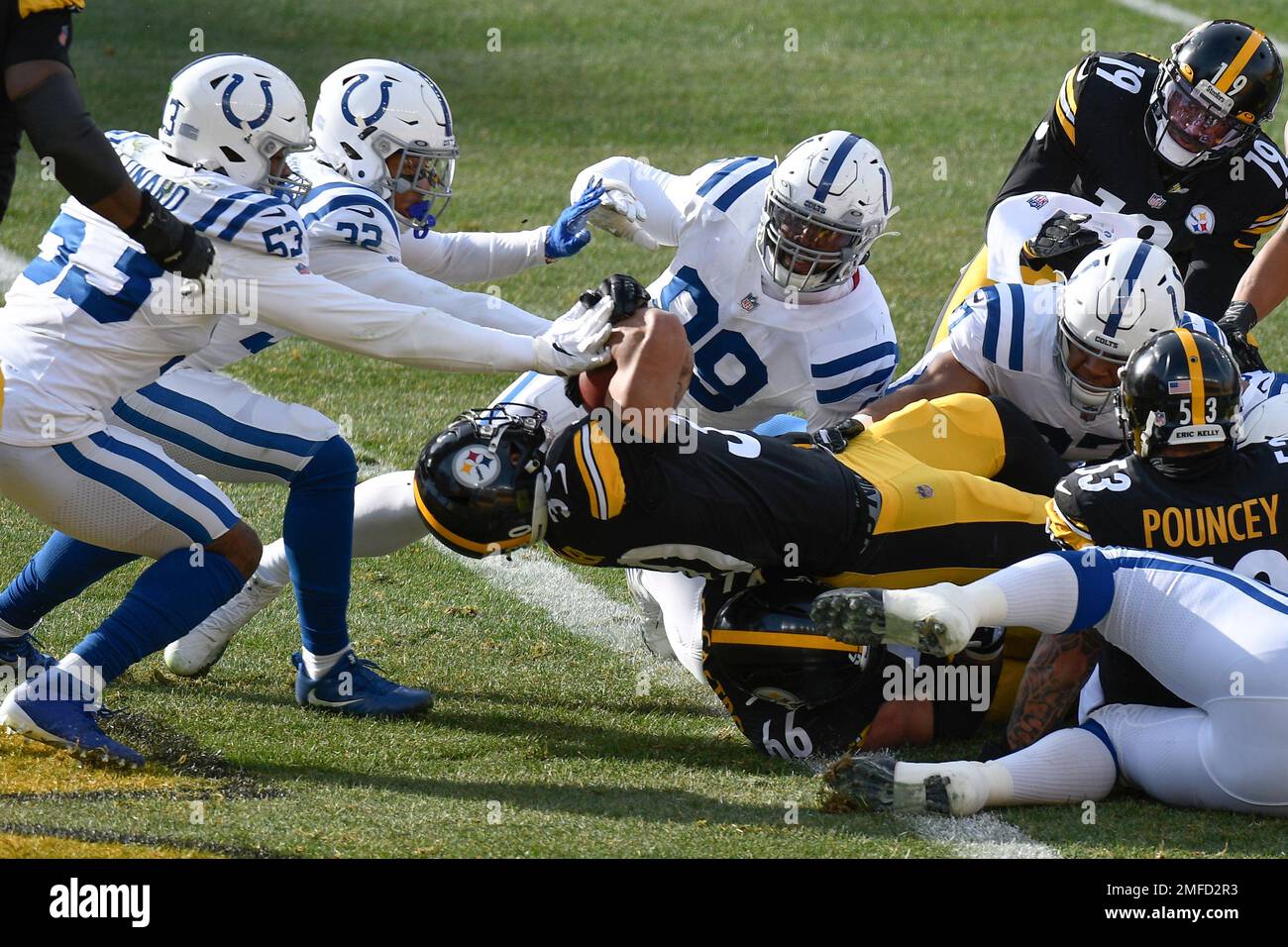 Pittsburgh Steelers running back James Conner (30) twists over the goal ...