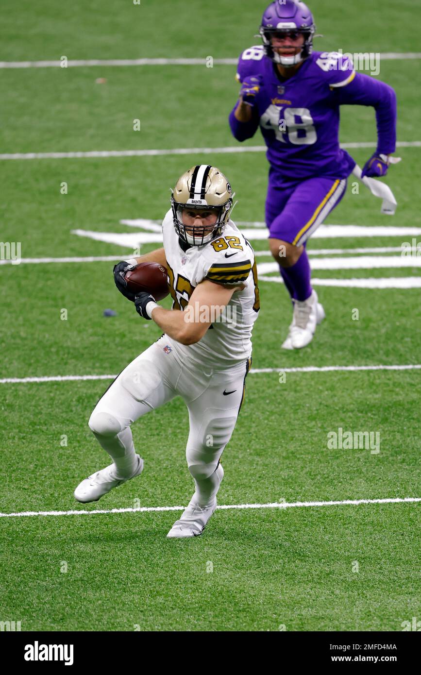 New Orleans Saints tight end Adam Trautman (82) runs past Minnesota ...