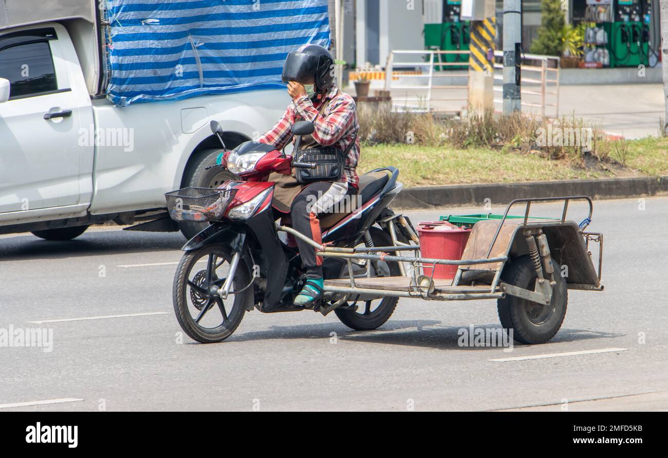 A man drives a motorcycle with an sidecar Stock Photo - Alamy