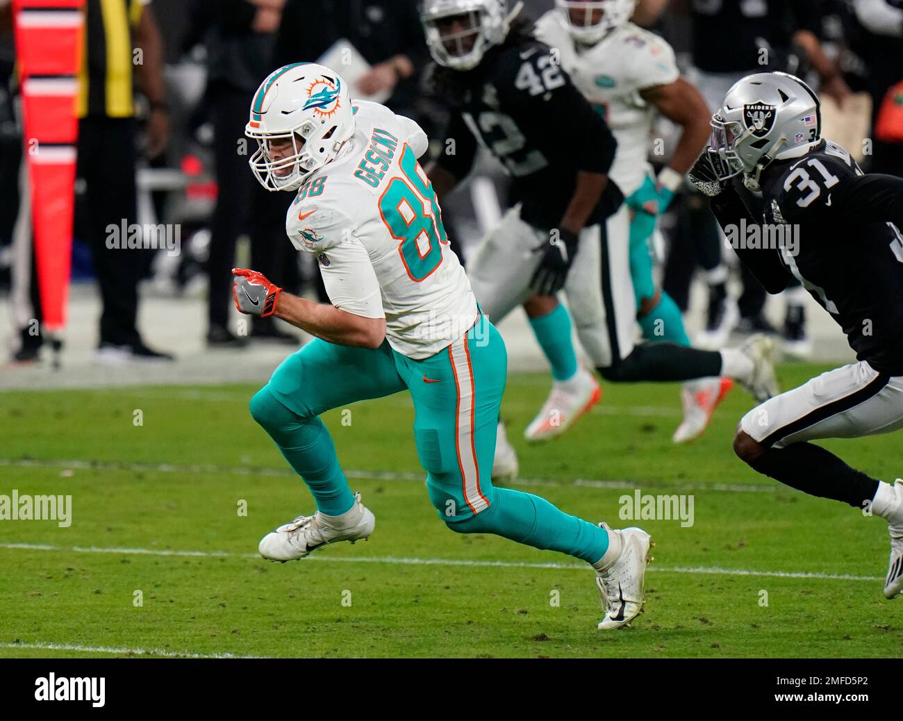 Miami Dolphins tight end Mike Gesicki #88 runs after catching a pass during the fourth quarter ...