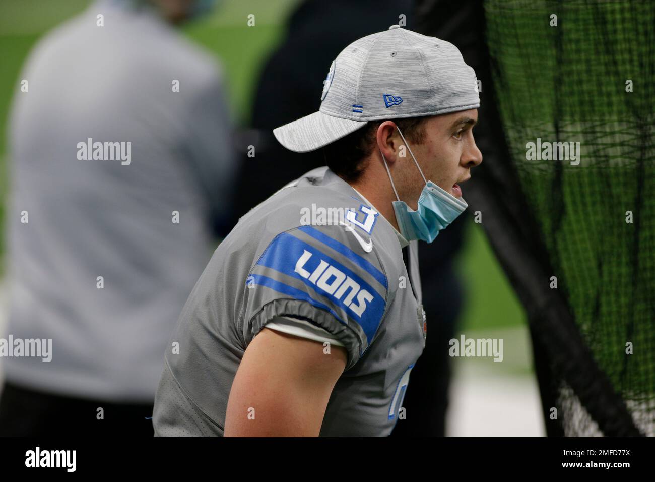 Detroit Lions punter Jack Fox walks in the bench area during the second ...
