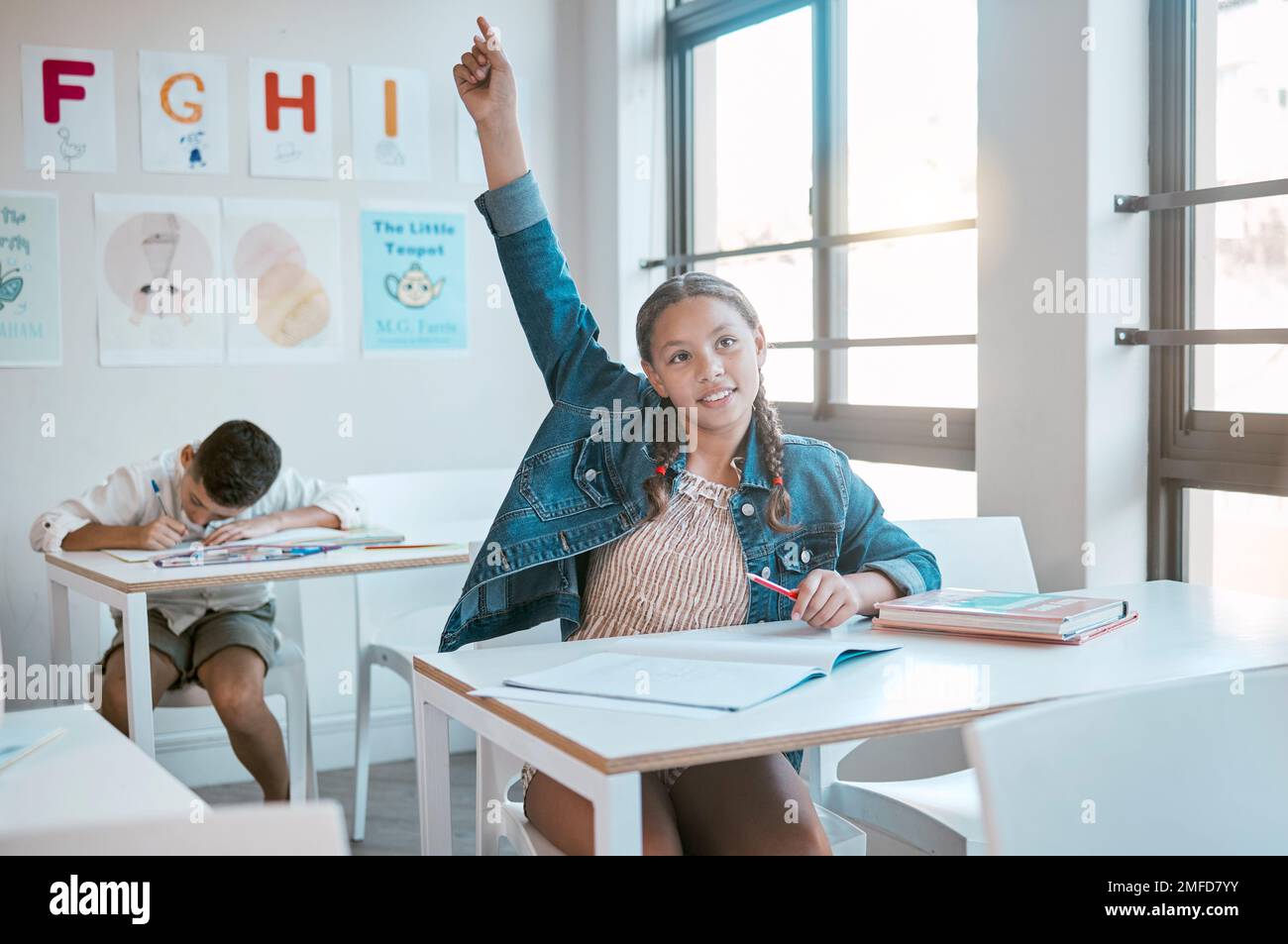 Kid excited answer class hi-res stock photography and images - Alamy