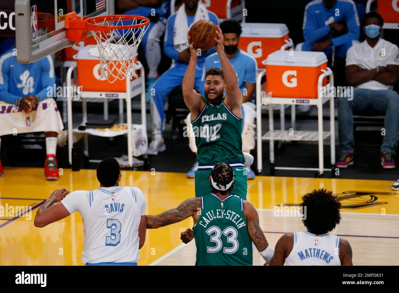 Dallas Mavericks' Maximilian Kleber (42) grabs a rebound against the ...
