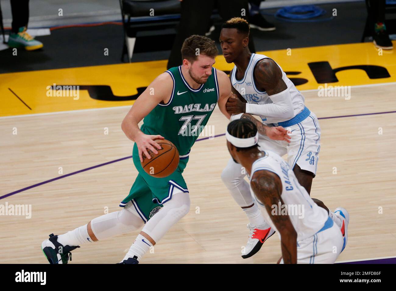 Dallas Mavericks' Luka Doncic (77) drives against Los Angeles Lakers ...