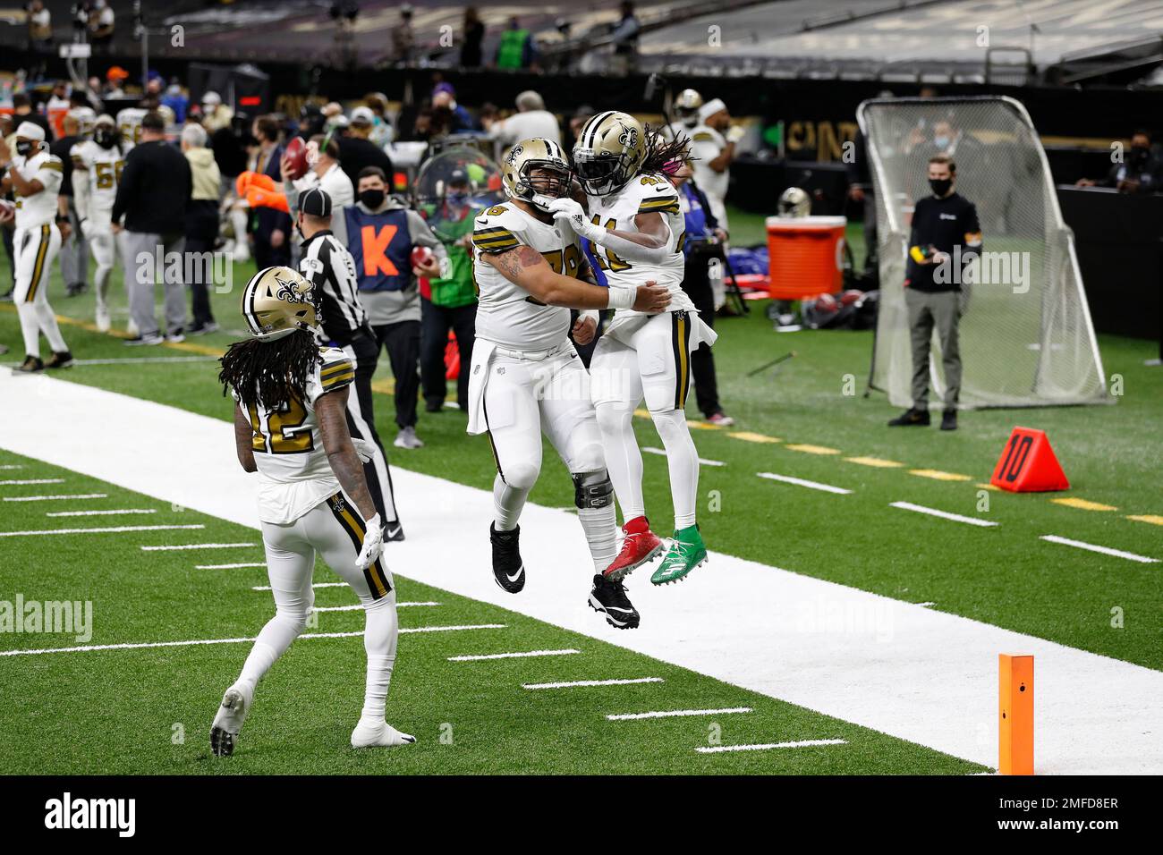 New Orleans Saints running back Alvin Kamara (41) and outside linebacker Kwon Alexander (58 ...