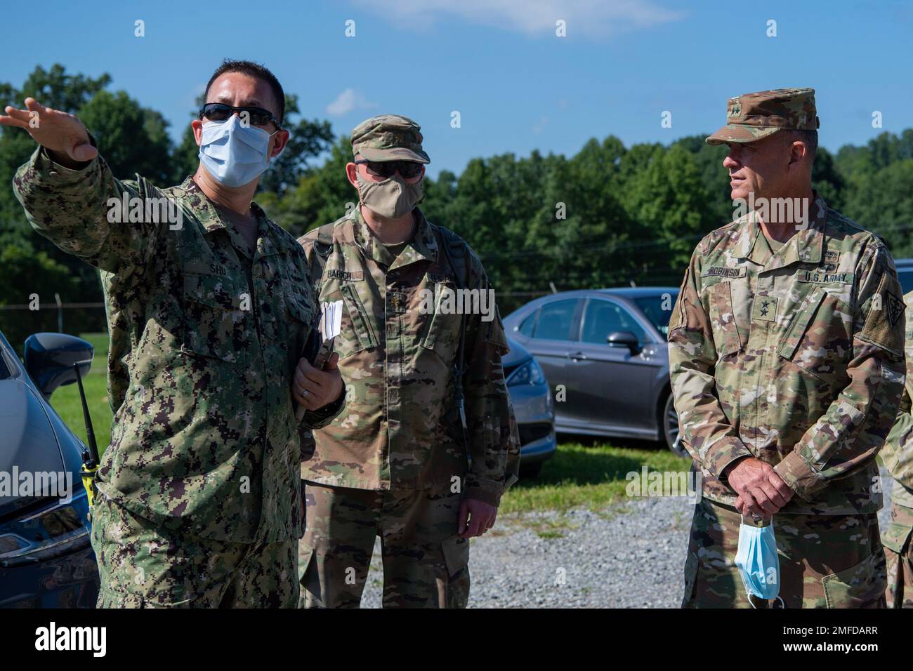 U.S. Navy Cmdr. Thomas Shu, a critical care flight nurse with Navy ...