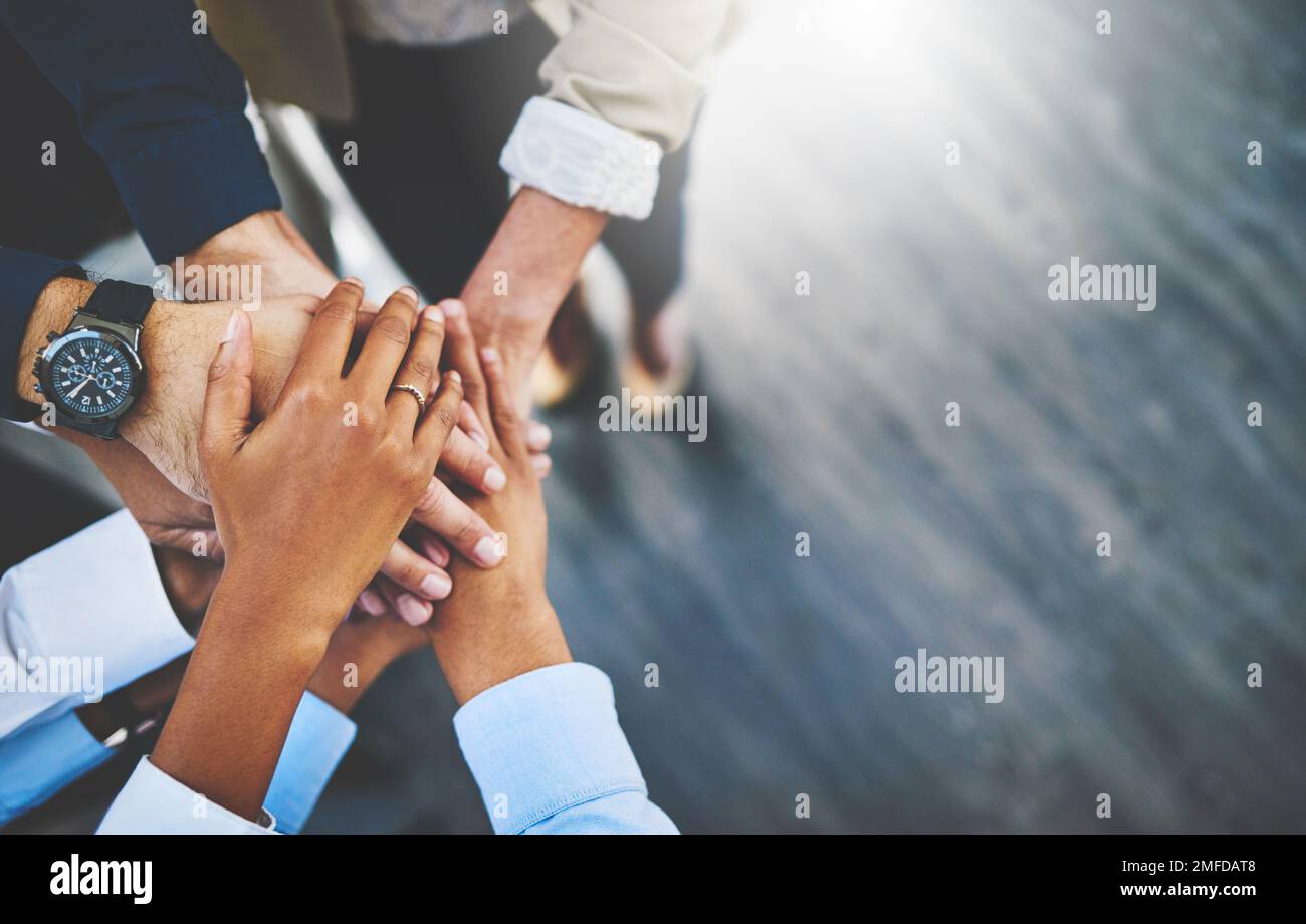 In the spirit of collaboration. a group of unrecognisable ...