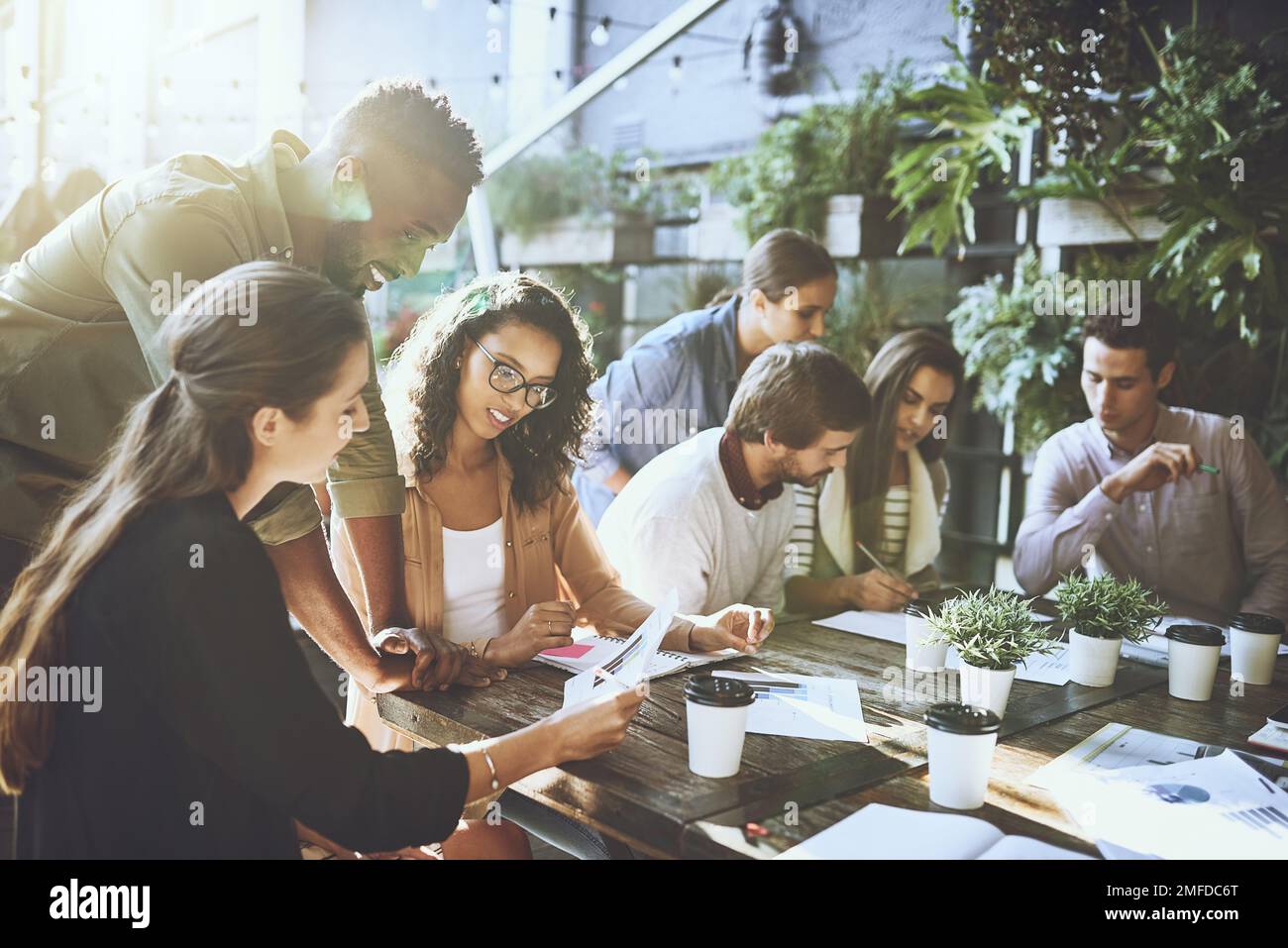 Who said business has to be in a boardroom. a group of colleagues ...