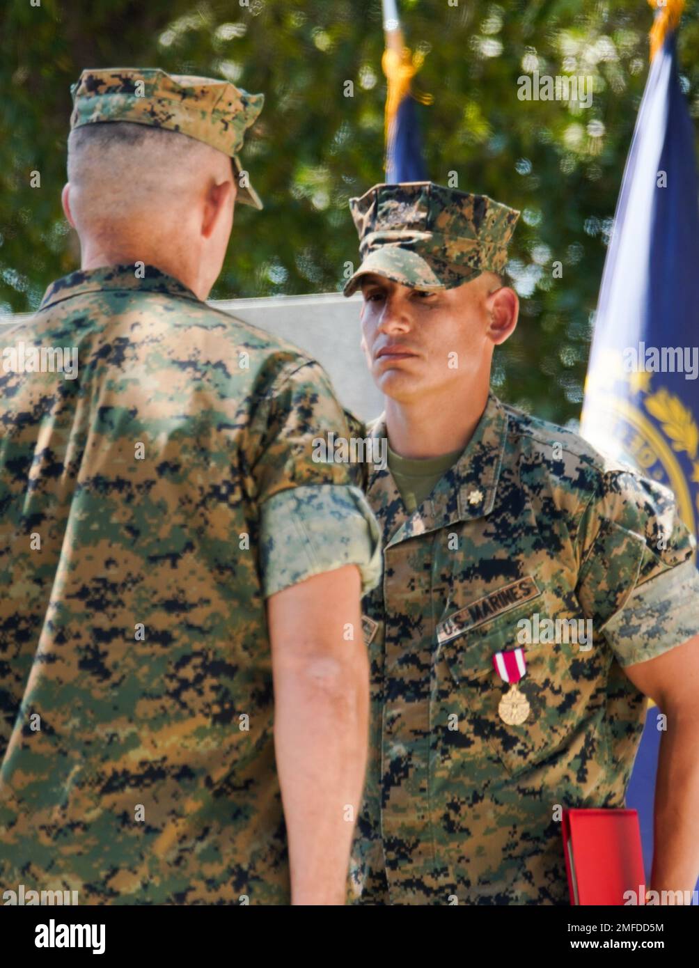 U.S. Marine Corps Maj. Jacob Fernandez (right), the outgoing assistant ...