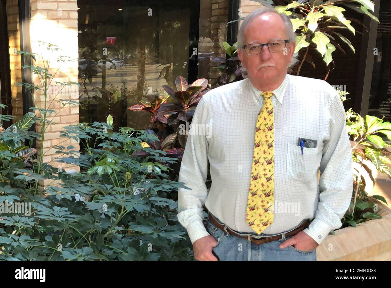 Defense attorney Harry Reinhart stands for a portrait at his office ...