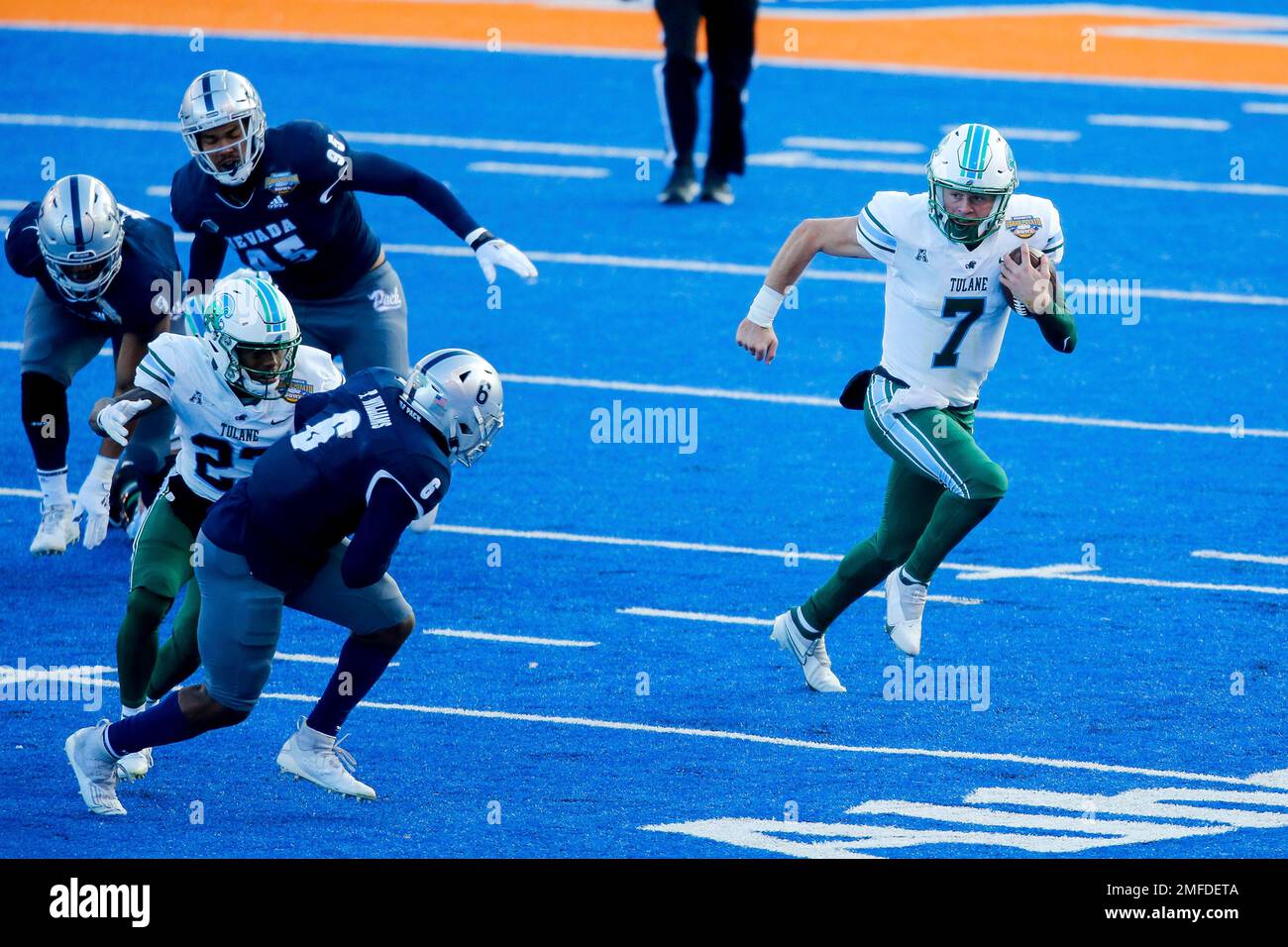 Tulane quarterback Michael Pratt (7) scrambles away from the Nevada ...
