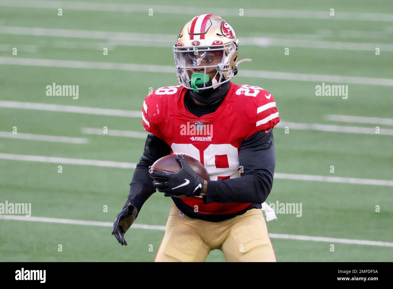 San Francisco 49ers running back Jerick McKinnon (28) runs with the ...