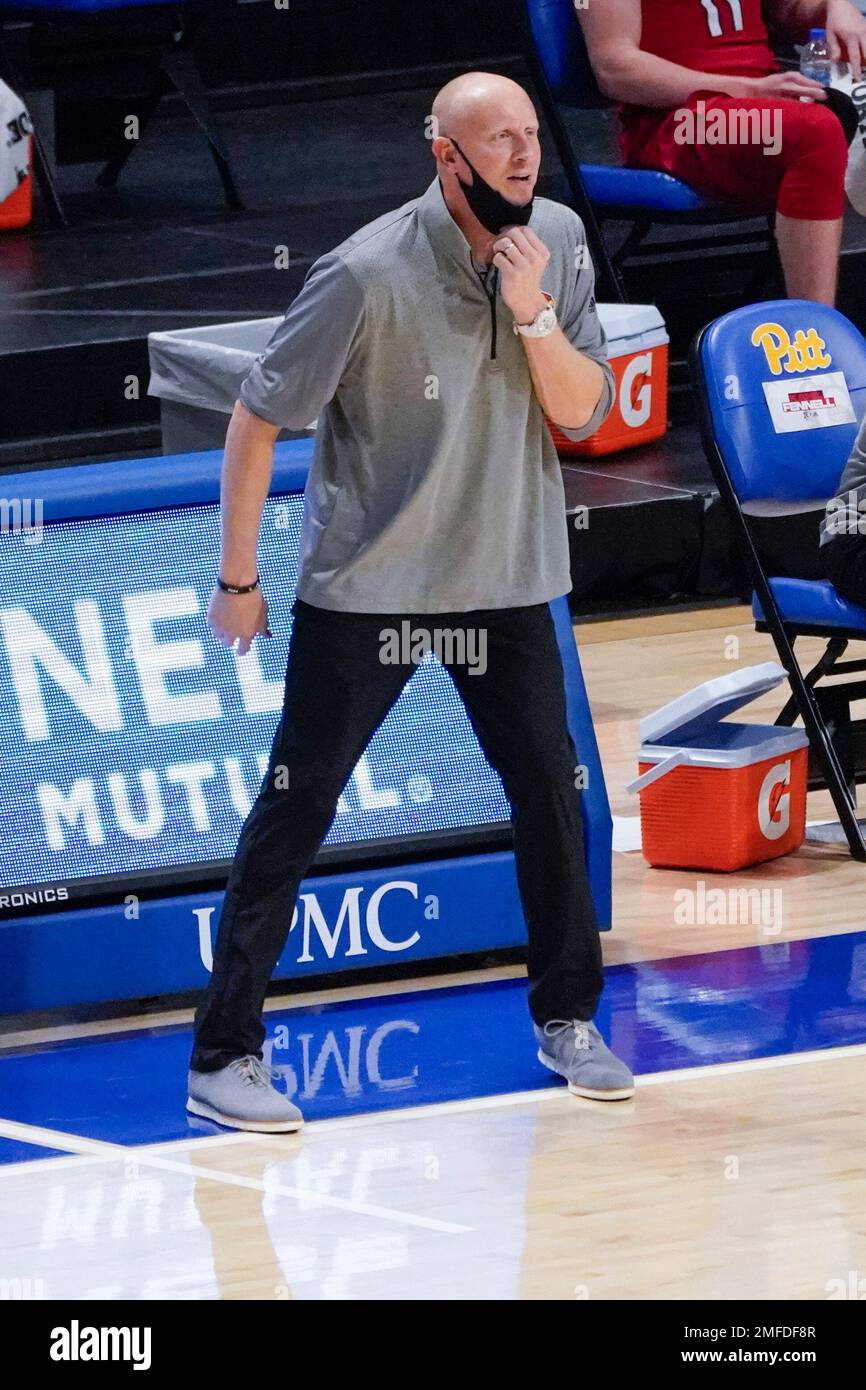 Louisville head coach Chris Mack works curtsied as his team plays ...