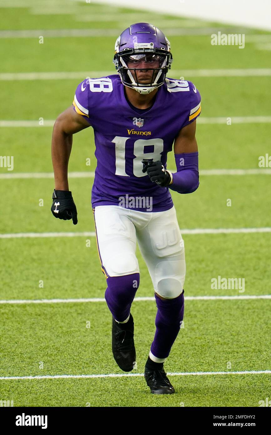 Minnesota Vikings wide receiver Justin Jefferson runs up field during ...