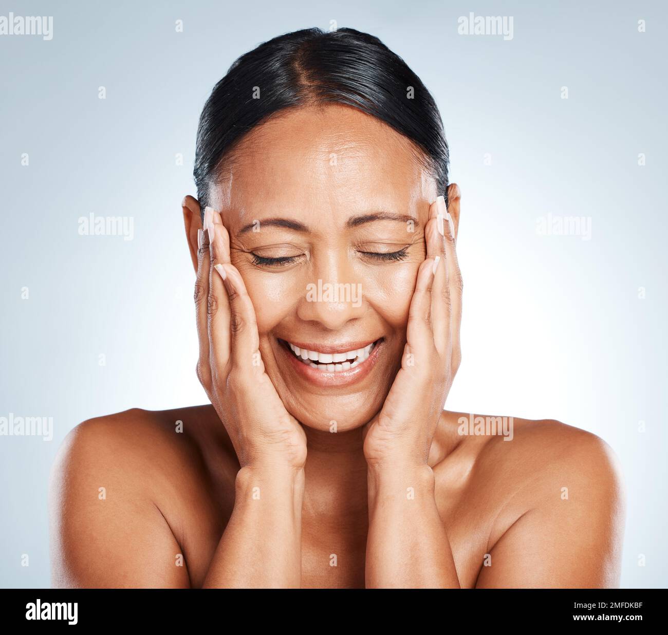 Hands, laughing and woman in studio for skincare, grooming and happy ...
