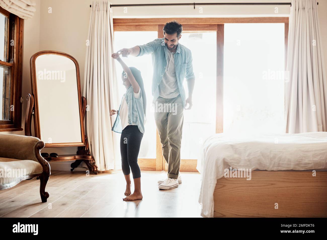 Every daughter deserves to dance with Dad. a happy father and daughter ...