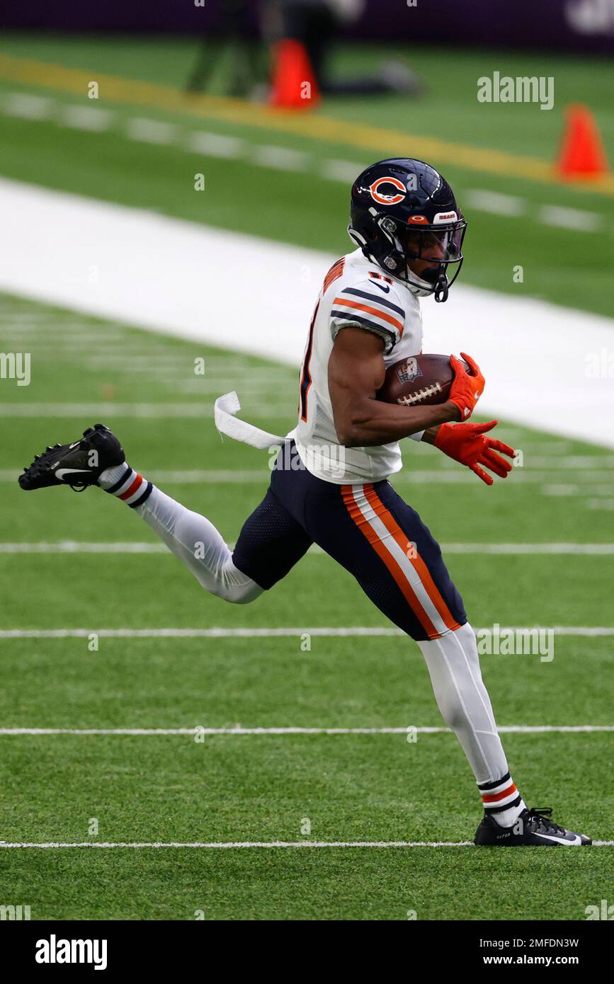 Chicago Bears wide receiver Darnell Mooney (11) runs with the ball ...