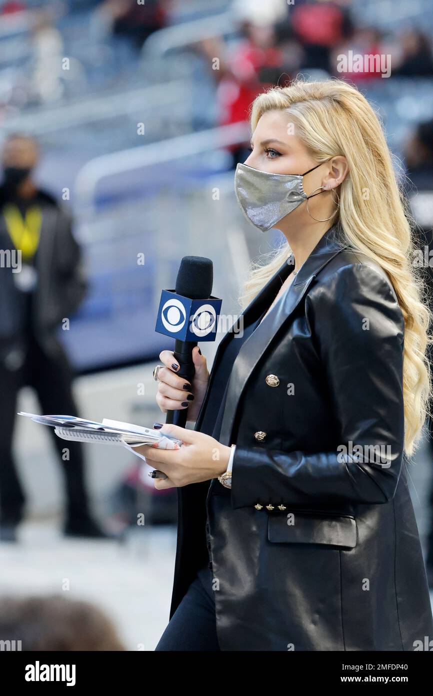 CBS sideline reporter Melanie Collins works reports during an NFL ...