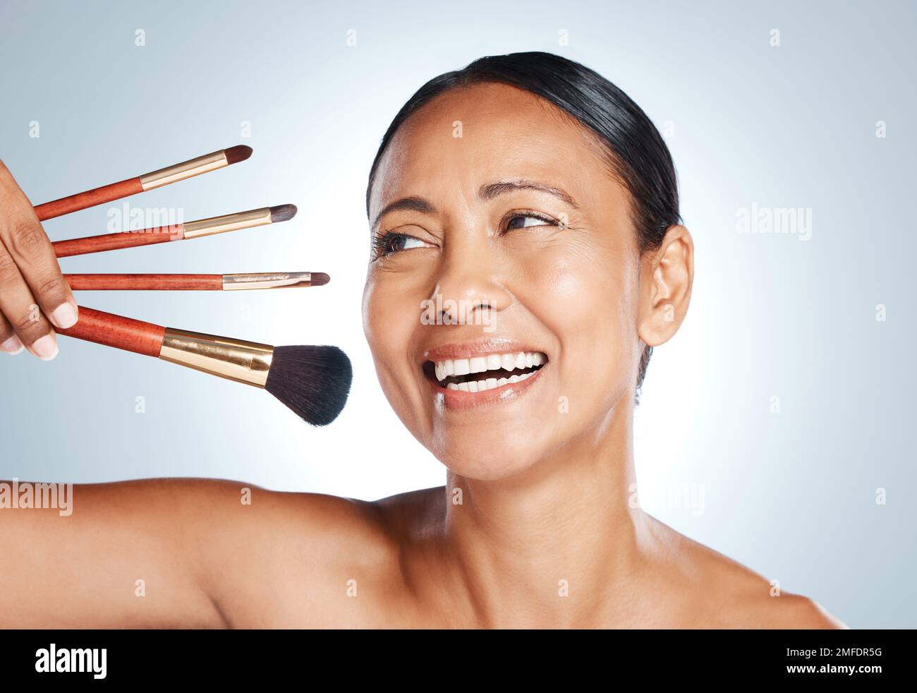 Makeup, skincare and old woman with brushes, foundation and with grey ...