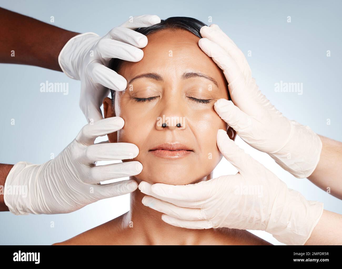 Cosmetics, plastic surgery and hands check woman face for laser, botox ...