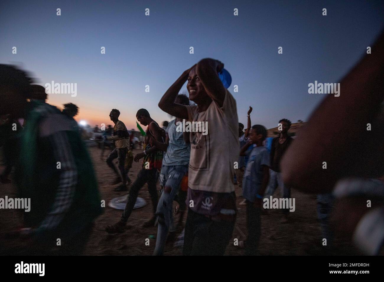 Men who fled the conflict in Ethiopia's Tigray region run to receive ...