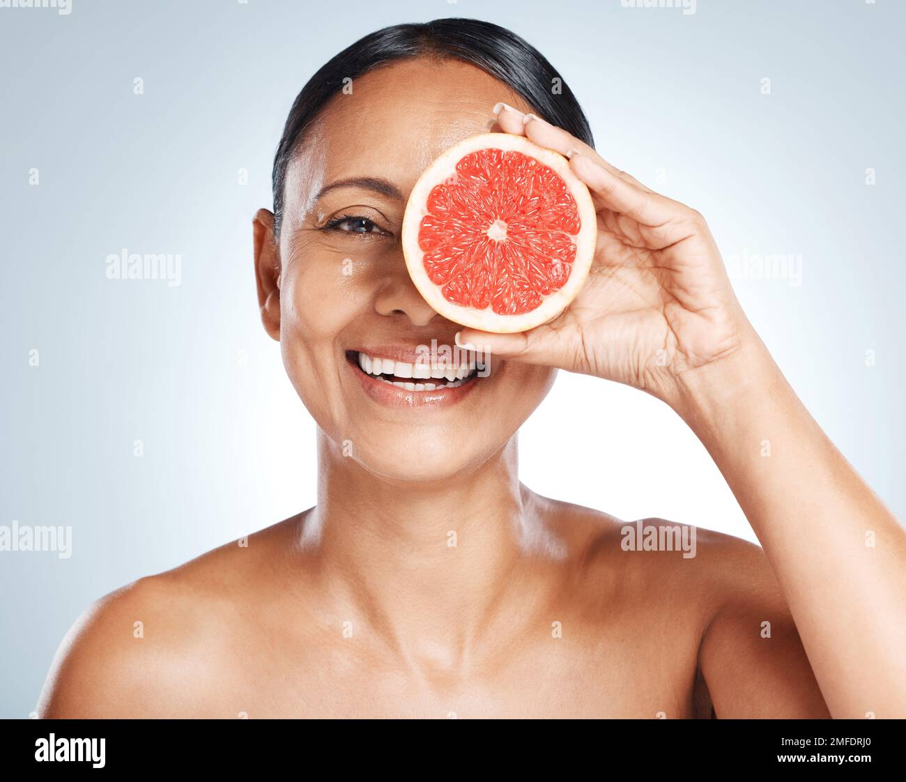 Grapefruit, woman and vitamin c beauty, portrait and skincare wellness ...