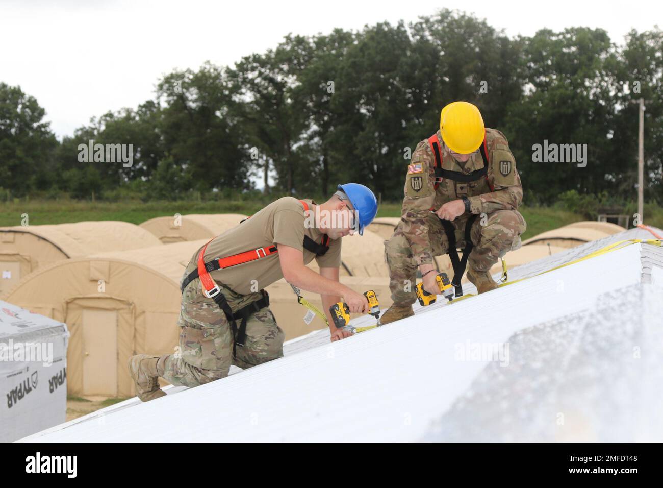 U.S. Army Reserve Spcs. Troy Viegut and Benjamin Haas assigned to the ...