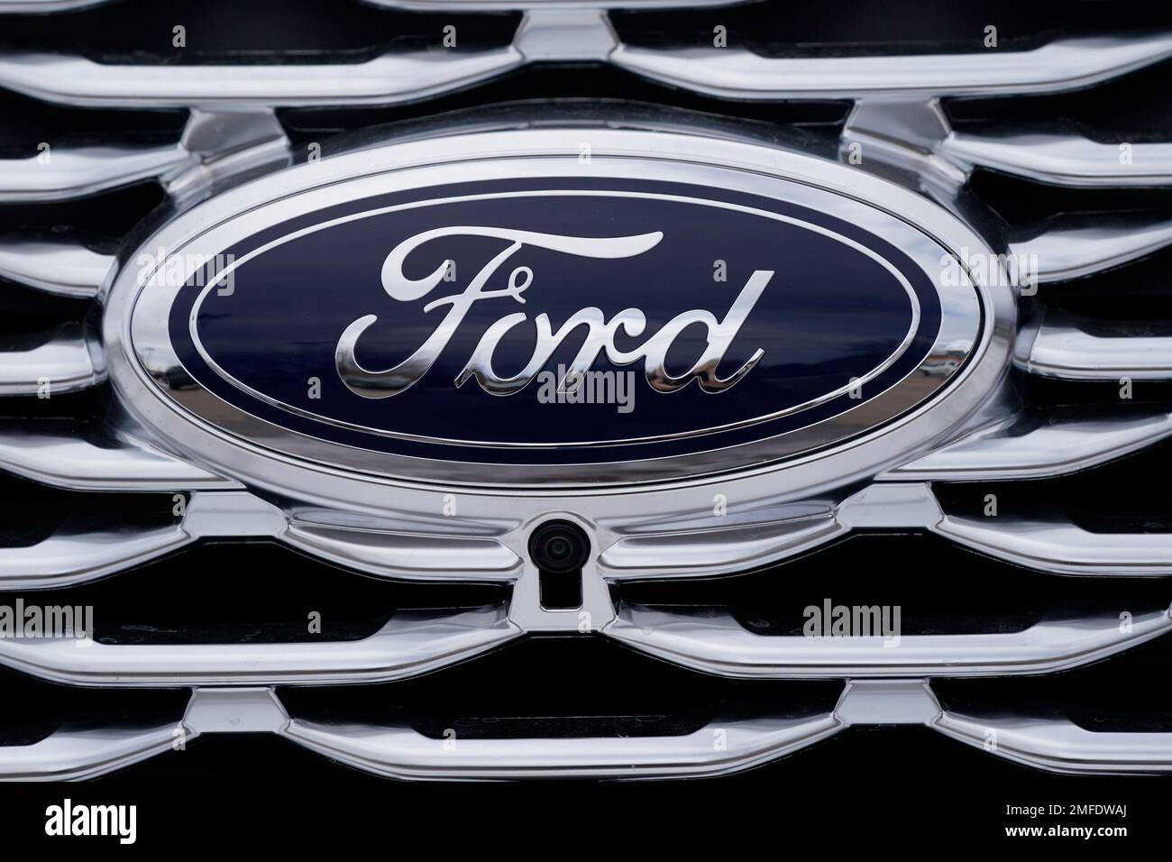 The company logo gleams off the chromed grille of an unsold 2021 ...