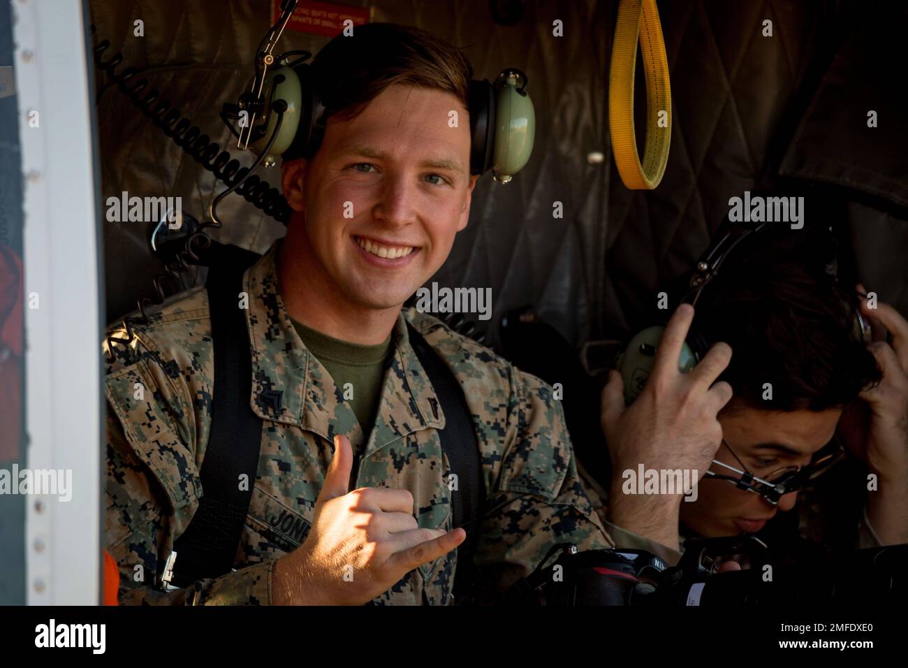 U.S. Marine Corps Cpl. Evan Jones, a combat videographer with American Forces Network Pacific ...