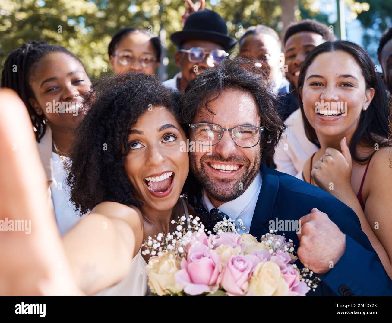Friends, bride and groom with wedding selfie for outdoor ceremony ...