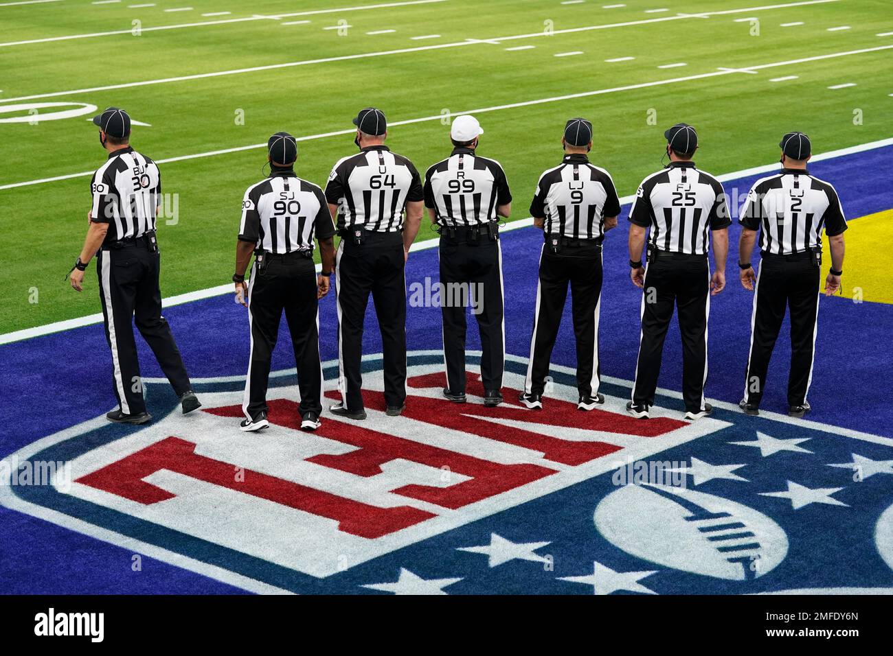 The officiation crew for an NFL football game between the Los Angeles ...