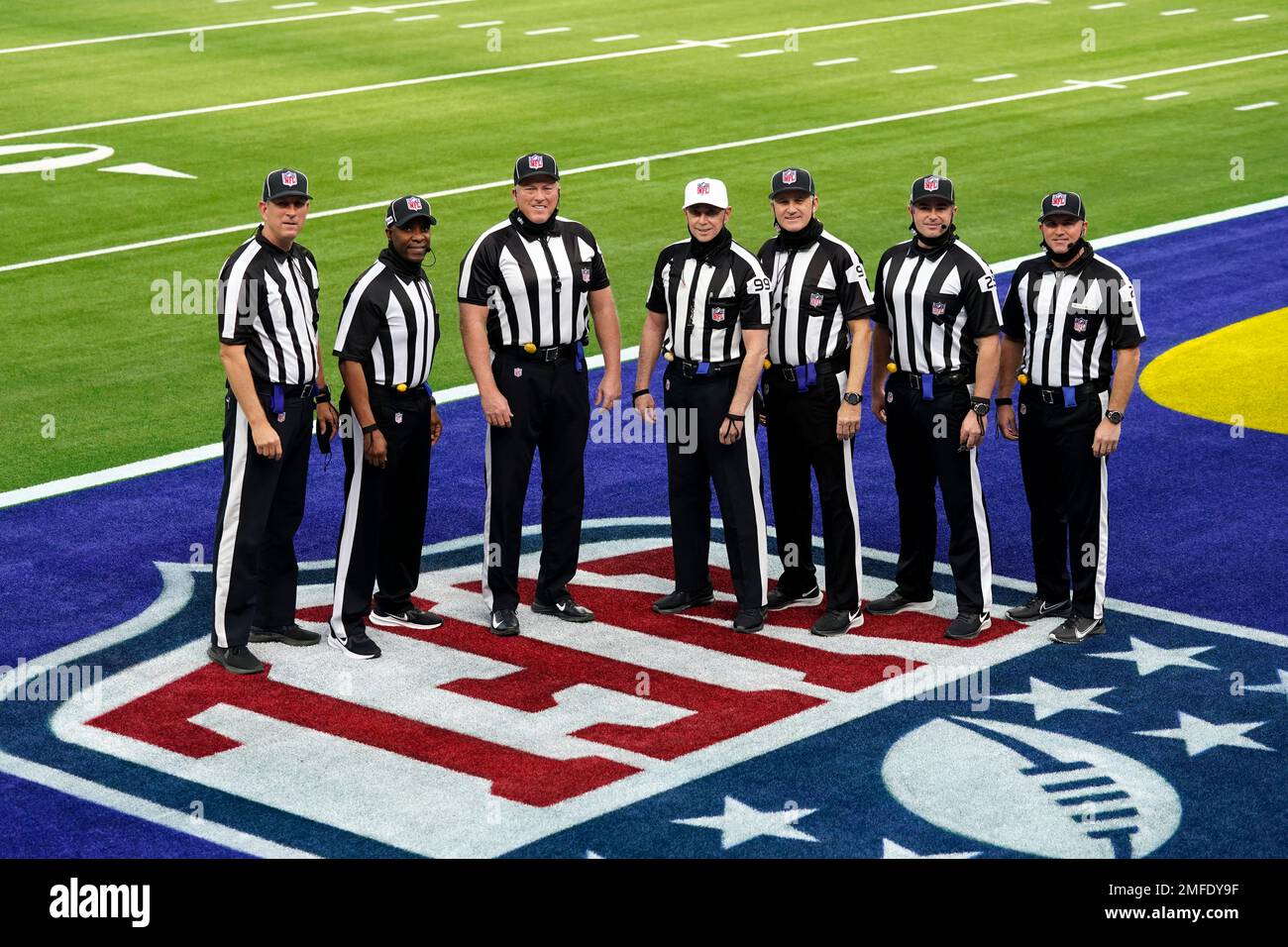 The officiation crew for an NFL football game between the Los Angeles ...