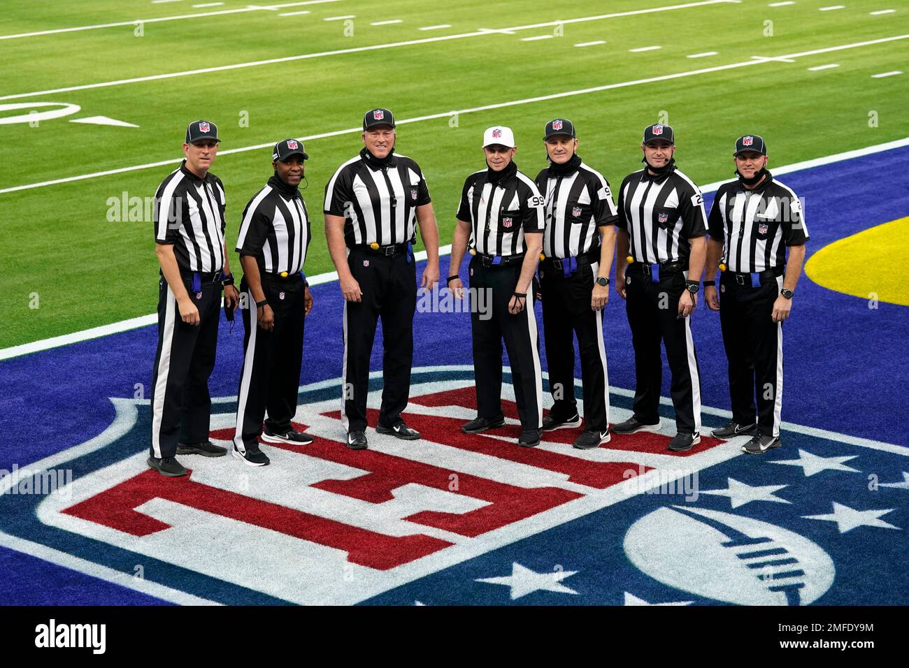The officiation crew for an NFL football game between the Los Angeles ...