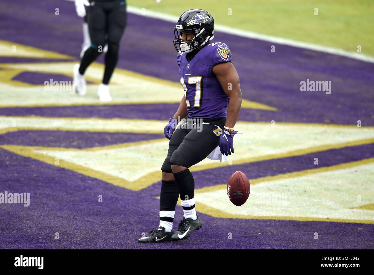Baltimore Ravens running back J.K. Dobbins reacts after scoring a ...