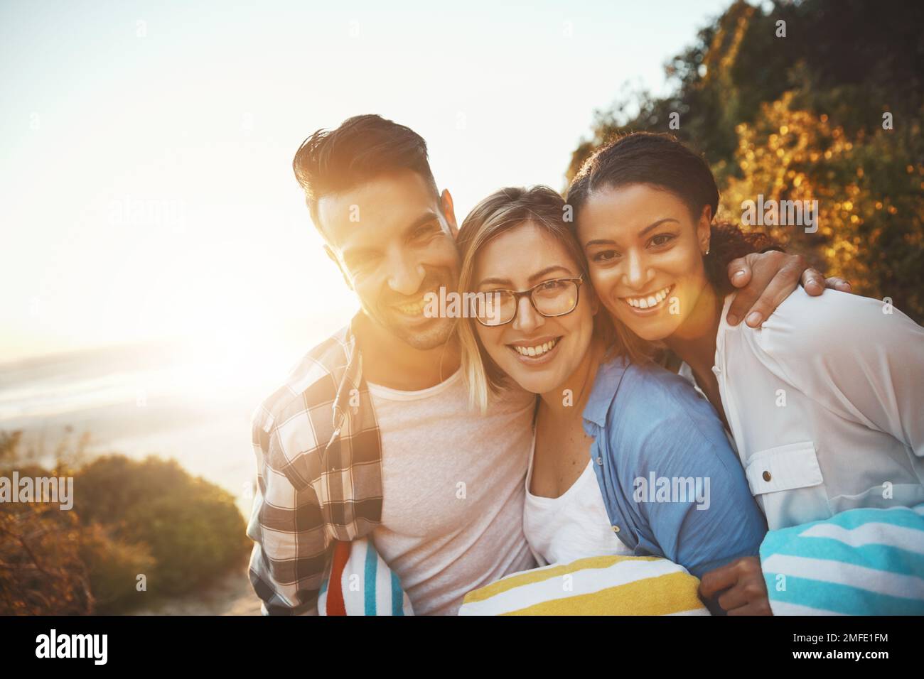 Make time for your friends. three friends enjoying themselves while ...