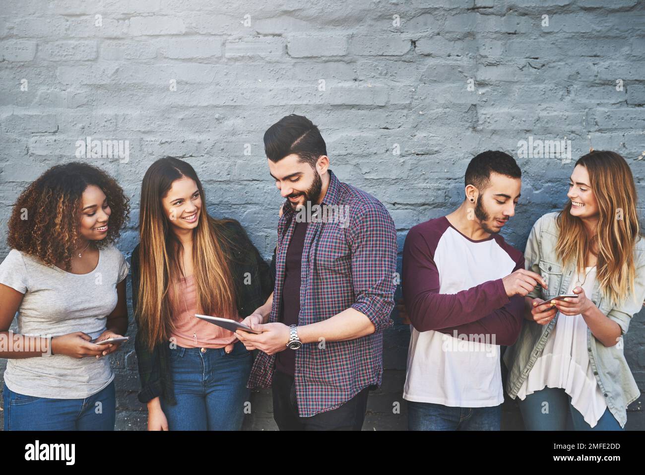 Todays generation is more social than ever before. a group of young ...