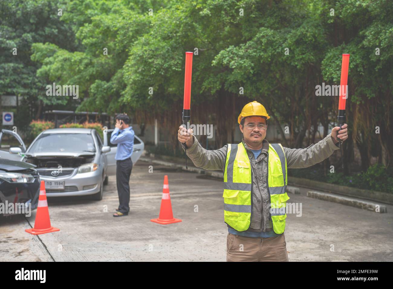 Traffic Man directing traffic after Crash Accident on the Road. Traffic ...