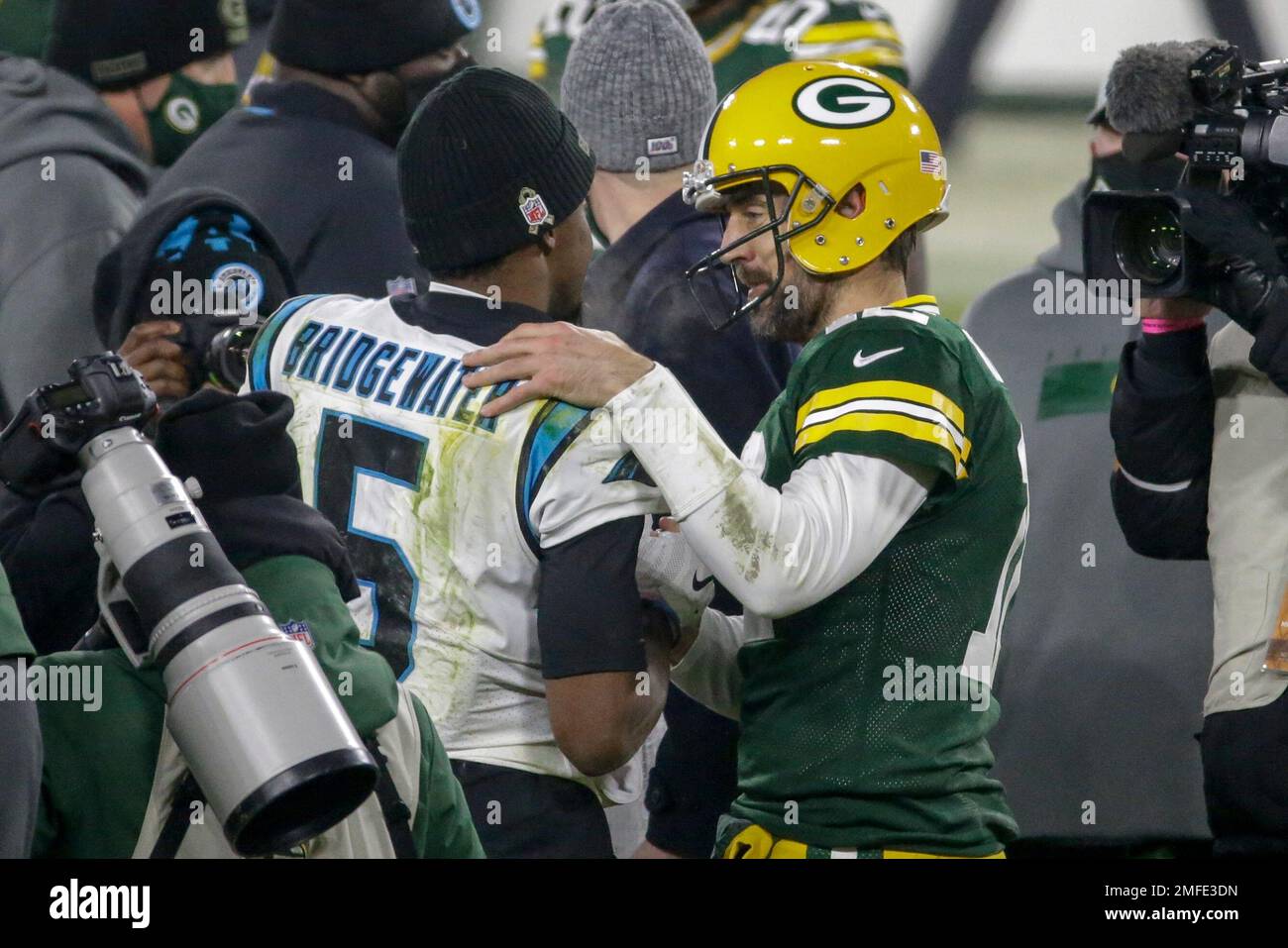 Green Bay Packers' Aaron Rodgers talks to Teddy Bridgewater after an ...