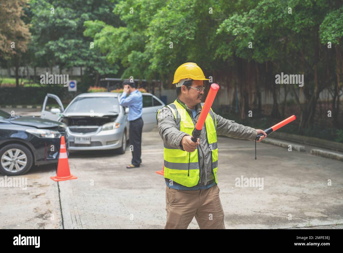 Traffic Man directing traffic after Crash Accident on the Road. Traffic ...