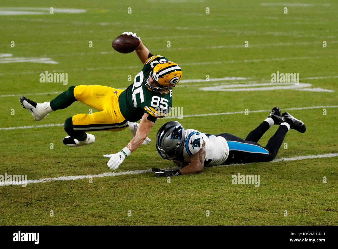 Green Bay Packers' Robert Tonyan gets past Carolina Panthers' Jeremy ...