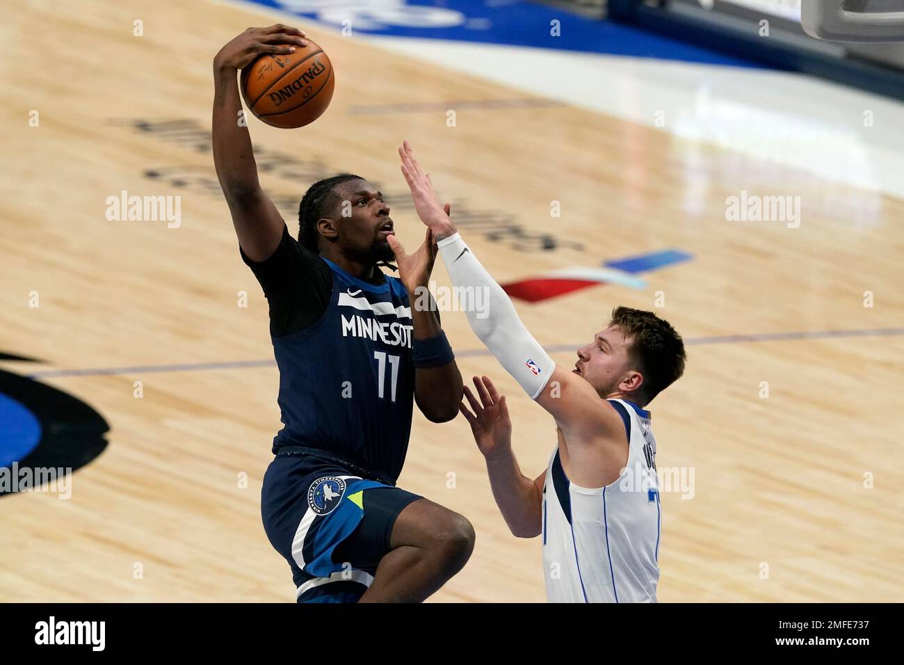 Minnesota Timberwolves center Naz Reid goes up to take a shot over ...